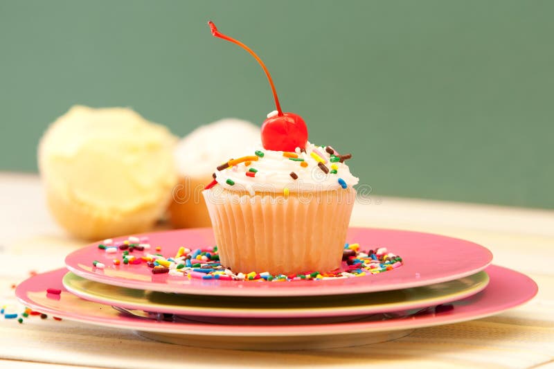 Single Cupcake with a Cherry on Top Stock Image - Image of paper ...