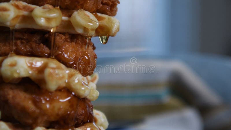 Single Drop of Syrup Falls from Chicken and Waffles Stock Video - Video ...