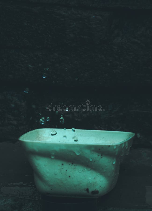 A single drop of water stock image. Image of ceramic - 256907669