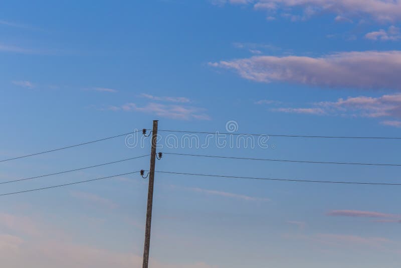 Single Electricity Pole with Wires on the Blue Sky Background. Stock ...