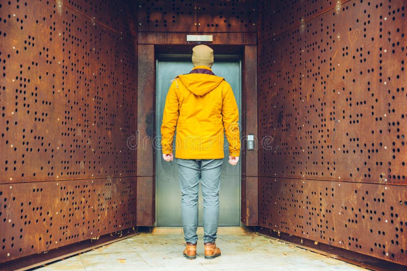 Single Elevator Door Outside Rusty Man Wiaitng for Elevator Stock Image ...