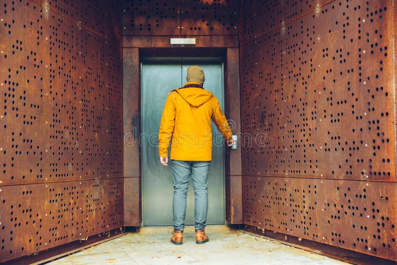Single Elevator Door Outside Rusty Man Wiaitng for Elevator Stock Image ...