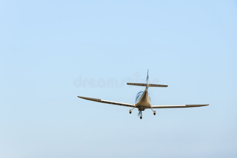 Single Engine Ultralight Aircraft Flying in the Sky. Empty Space for ...