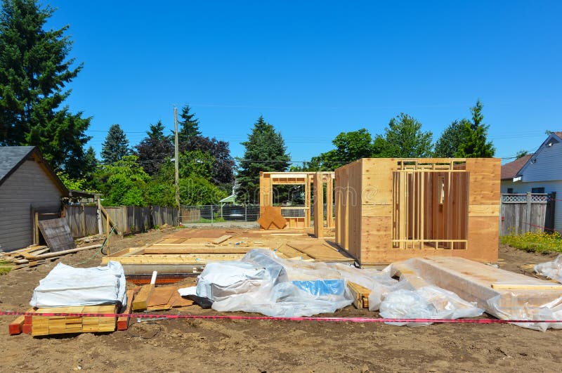 Single Family Home Under Construction on Blue Sky Background Stock ...