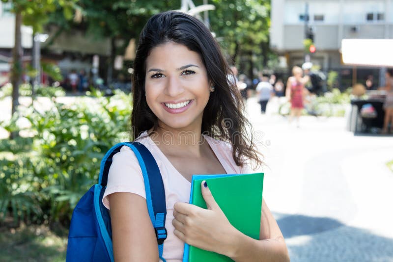 Single Female Student Looking at Laughing at Camera Stock Photo - Image ...