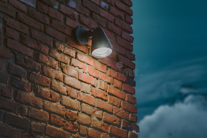 Single Flood Light Partially Illuminates Rustic Brick Wall Stock ...