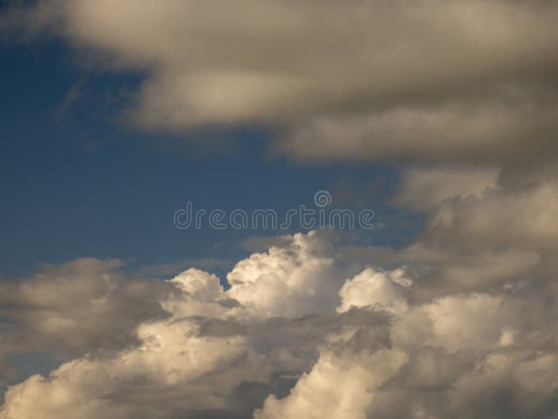 Single Fluffy Cloud Over Sunset Sky Background. Fluffy Cumulus Cloud ...