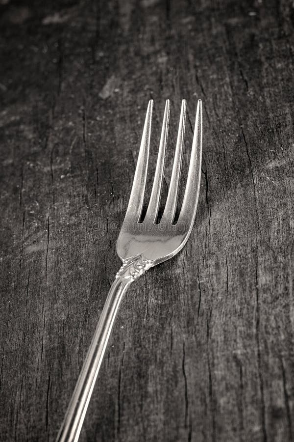 Single Fork on Old Wooden Plank Stock Photo - Image of high, still ...