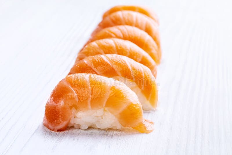 Single fresh salmon sushi stock image. Image of healthy - 232076401
