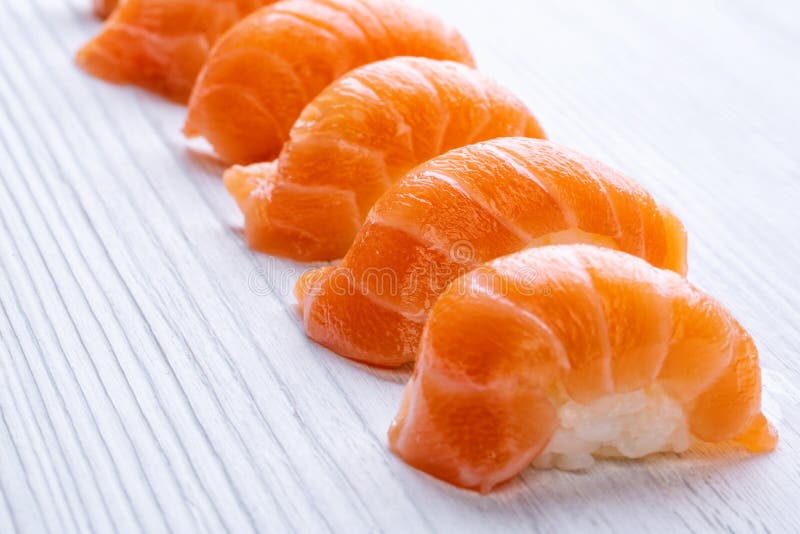 Single fresh salmon sushi stock image. Image of restaurant - 233223379