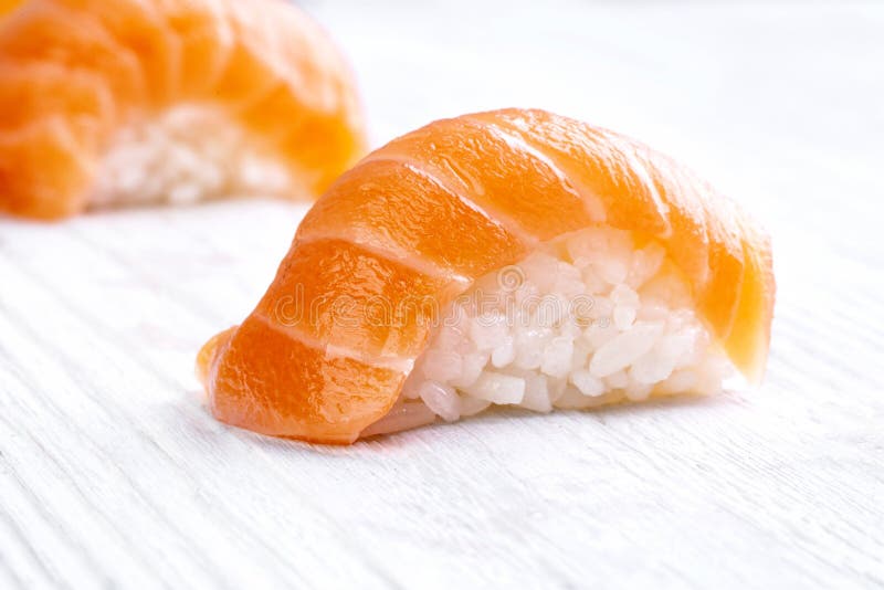 Single fresh salmon sushi stock photo. Image of salmon - 232076444
