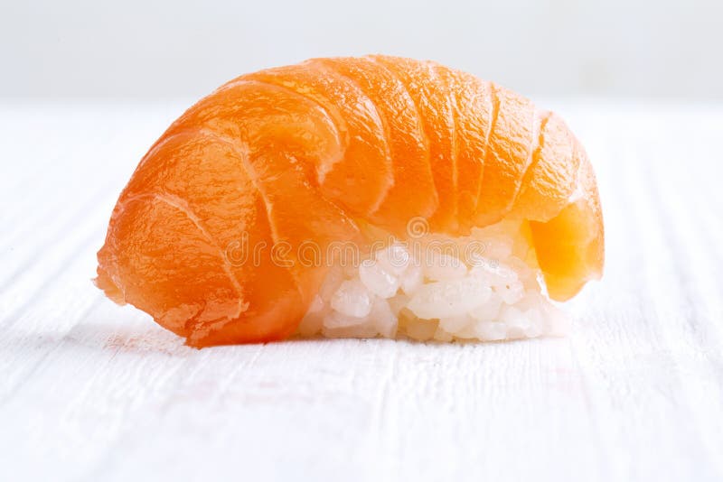 Single fresh salmon sushi stock image. Image of gourmet - 232076461