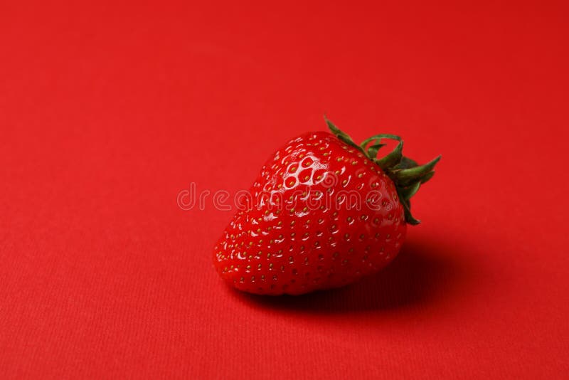 Single Fresh Tasty Strawberry on Red Background Stock Photo - Image of ...