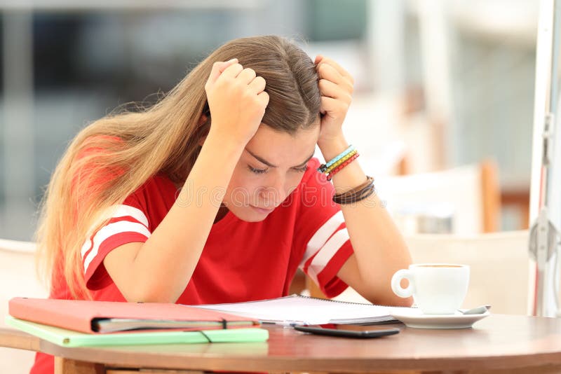 Frustrated Student Trying To Understand Notes in a Bar Stock Photo ...