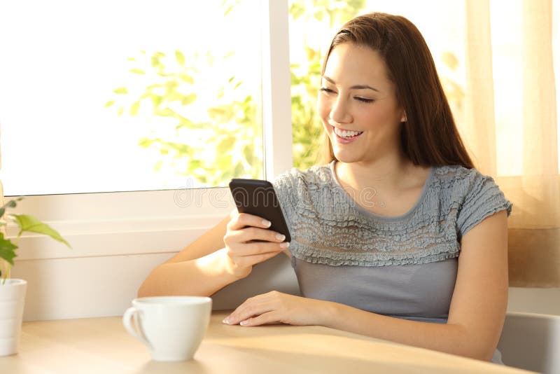 Single Girl Chatting on a Mobile Phone at Home Stock Photo - Image of ...