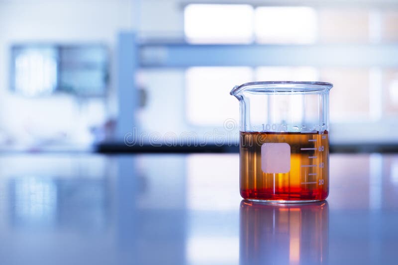 Orange solution in lab stock image. Image of result - 132212969