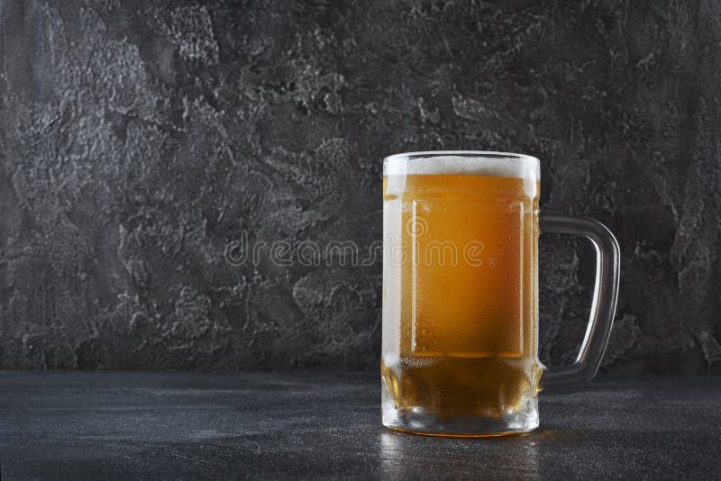 Single Glass Mug of Cold Beer with Foam Stock Photo - Image of copy ...