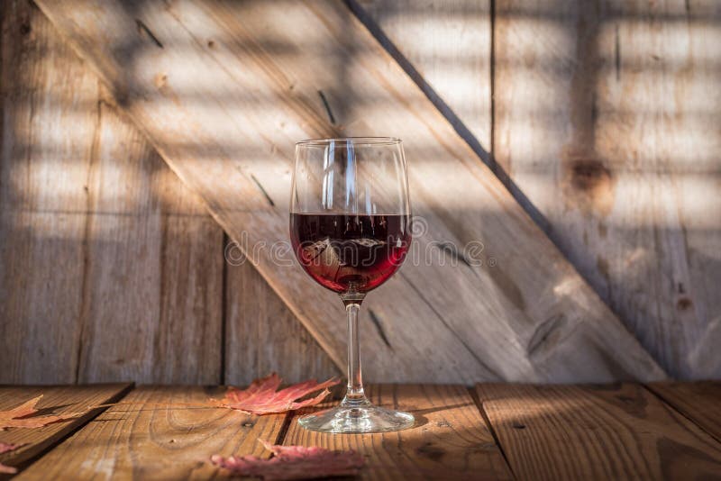 Single Glass of Red Wine on Wood Table Stock Photo - Image of tasting ...