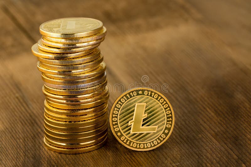 Single Gold Litecoin Coin Alongside A Stack Stock Photo - Image of gold ...