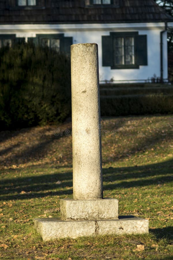 Single Granite Obelisk in Front of a House Stock Image - Image of ...