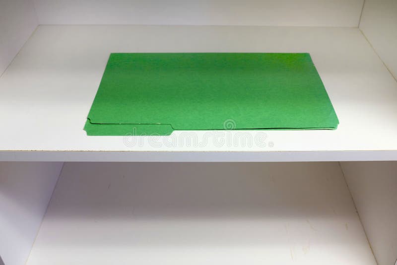 Single Green File on Shelf for Business Stock Image - Image of data ...