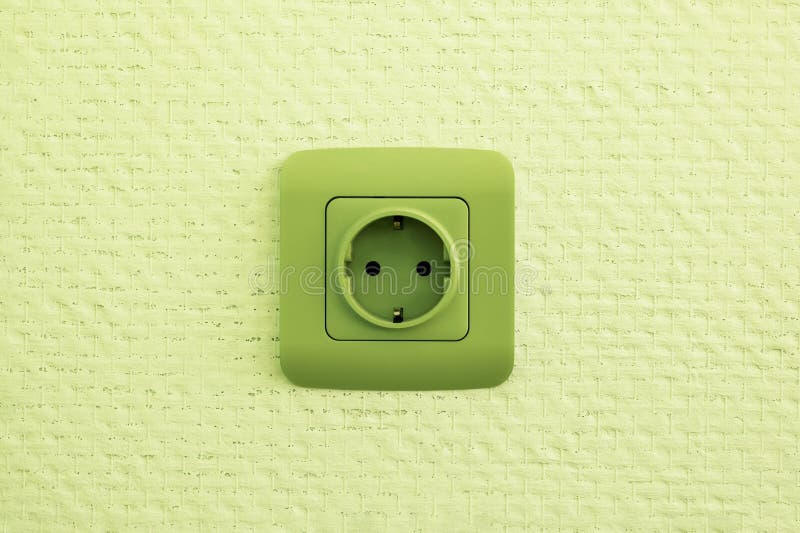 Single Green Power Outlet on the Green Wall. Stock Image - Image of ...