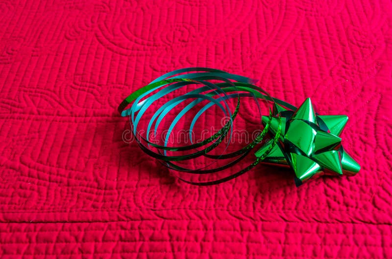 Green Present with Red Ribbon Over Snow Stock Photo - Image of modern ...