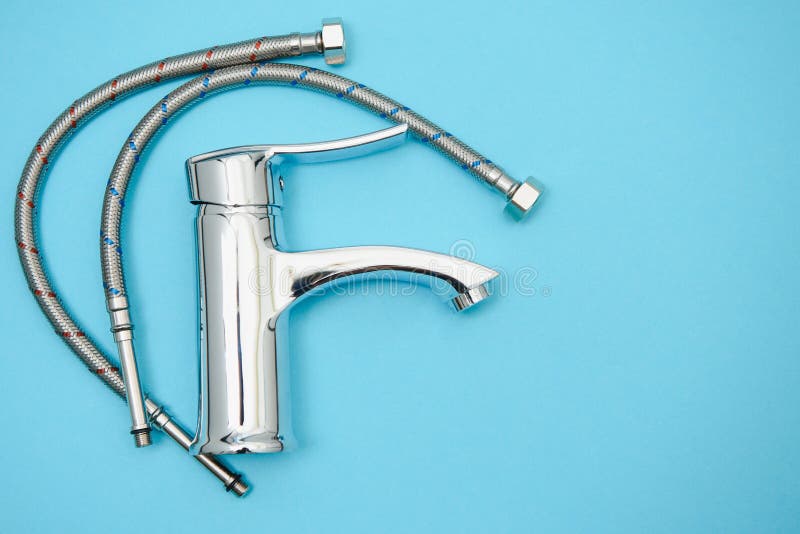 Single Handle Water Tap on Light Blue Background. New Chrome or Steel ...