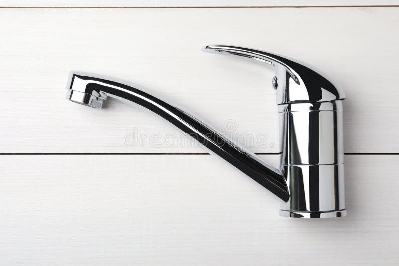 Single Handle Water Tap on White Wooden Table, Top View Stock Image ...