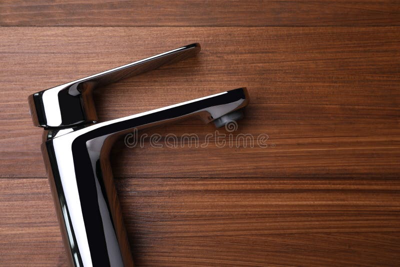 Single Handle Water Tap on Wooden Table, Top View. Space for Text Stock ...