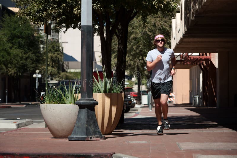Single, Handsome Male Running Stock Photo - Image of shorts, shirt ...