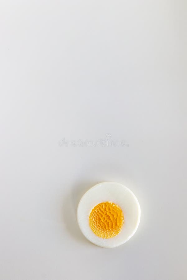 Single Hard Boiled Egg Slice on White Background Stock Photo - Image of ...
