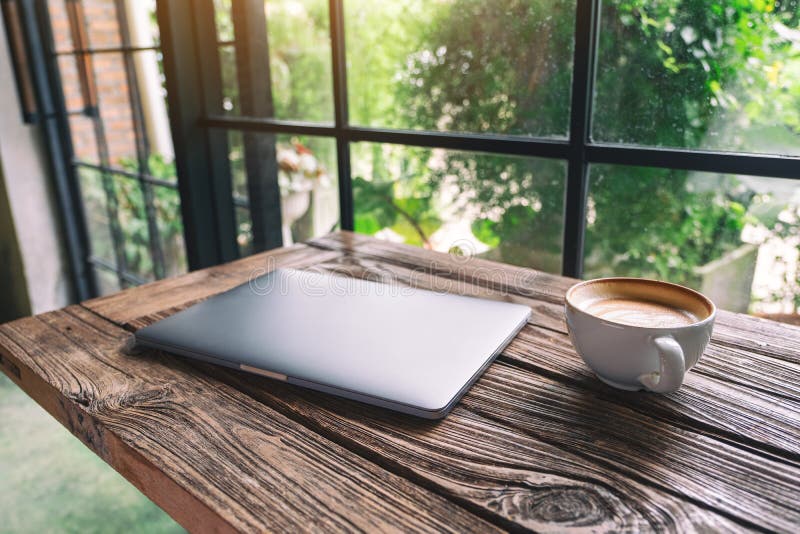 A Single Laptop Computer on Wooden Table Stock Photo - Image of copy ...