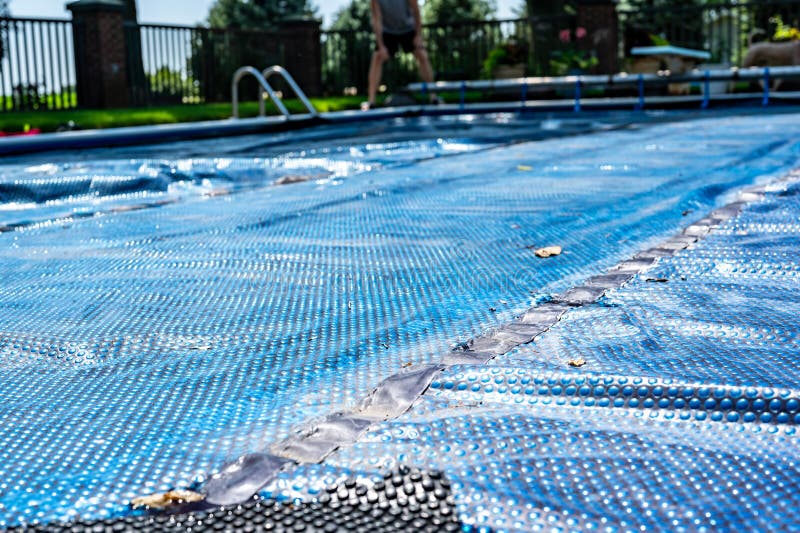 Single Leave on a Retractable Floating Pool Cover To Keep Out Leaves ...