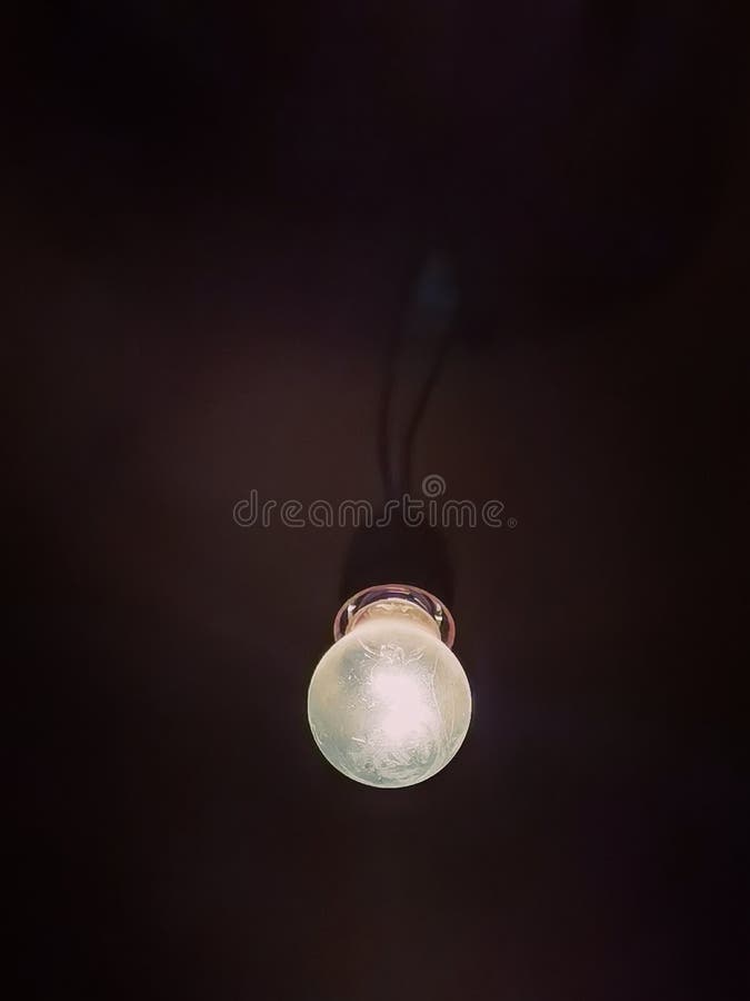 Single Light Bulb on Dark Background. Electricity, Power Stock Image ...