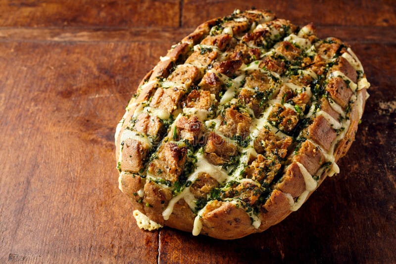 Single Loaf of Cheese Stuffed Party Bread Stock Photo - Image of board ...
