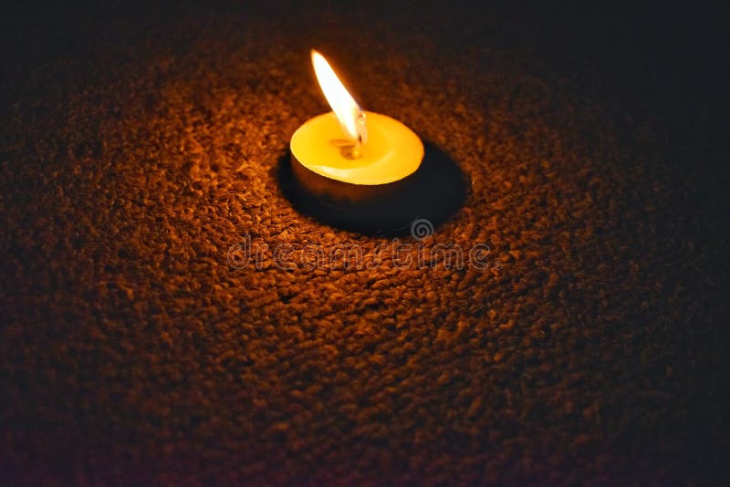 Single lone candle glow stock photo. Image of font, dark - 253600968