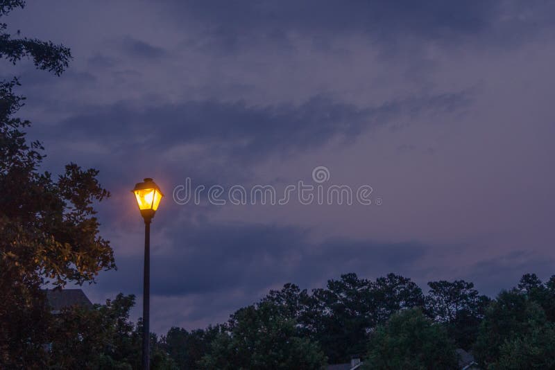 Single Lone Street Light Lamp Post at Night Shining in the Dark in the ...