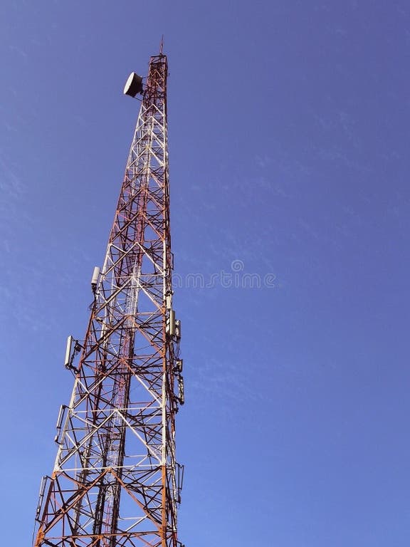 A Single Lonely Tower with Clear Blue Sky Back Grounds Stock Photo ...