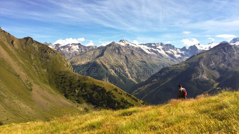Single man alone in alps editorial stock photo. Image of european ...