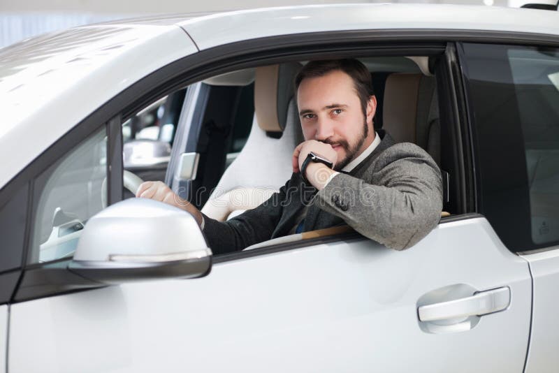 Single Man Chooses a Car in the Showroom Stock Image - Image of sale ...