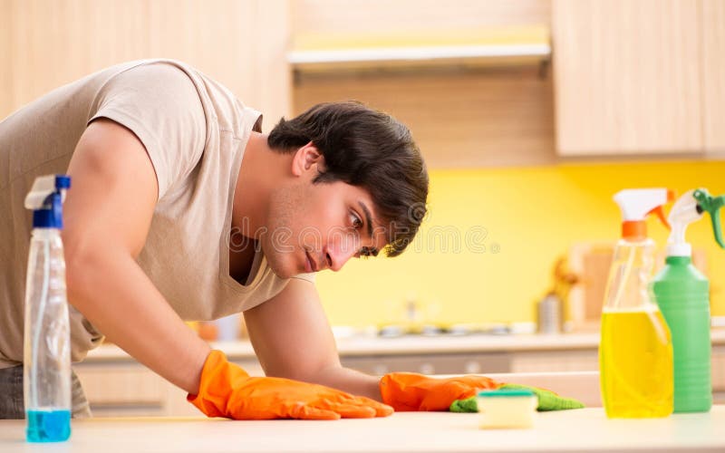 Single Man Cleaning Kitchen at Home Stock Photo - Image of cleanliness ...