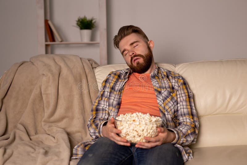 Single Man on the Couch Watching TV Stock Image - Image of hand ...