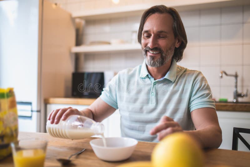 Single Man Having Breakfast in the Kitchen at Home Stock Photo - Image ...