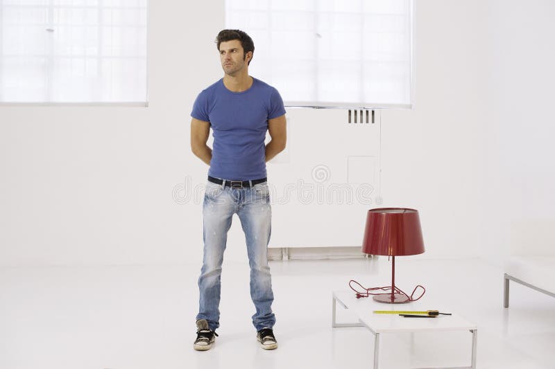 Single man at home stock photo. Image of room, adult - 17992482
