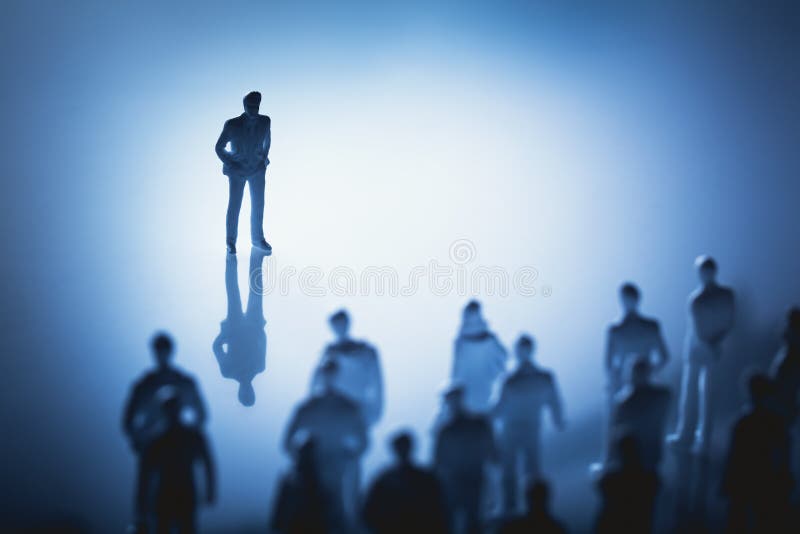 Single Man Standing in Front of Group of People. Stock Image - Image of ... Single Man Standing in Front of Group of People. Stock Image - Image of ...