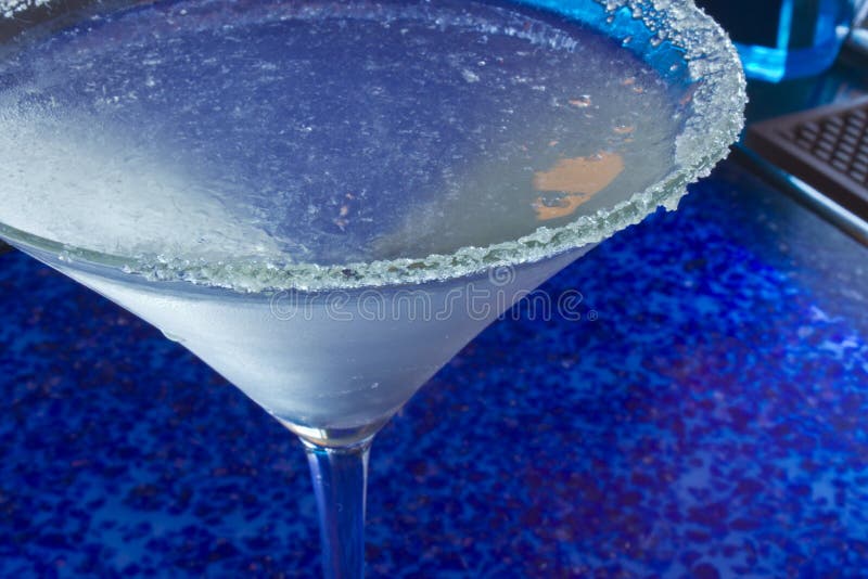 Ice Cold Martini - Blue Background Stock Image - Image of female, adult ...