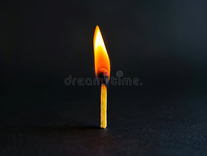 A Single Matchstick is Lit Up in the Dark Stock Photo - Image of ...