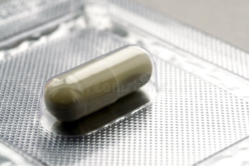 Single Medical Pill in Foil Wrapping Stock Photo - Image of addiction ...