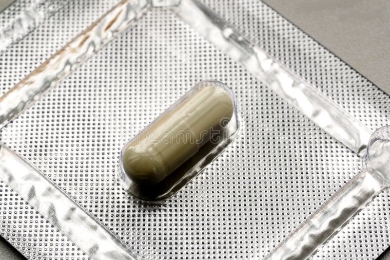 Single Medical Pill in Foil Wrapping Stock Image - Image of antibiotic ...